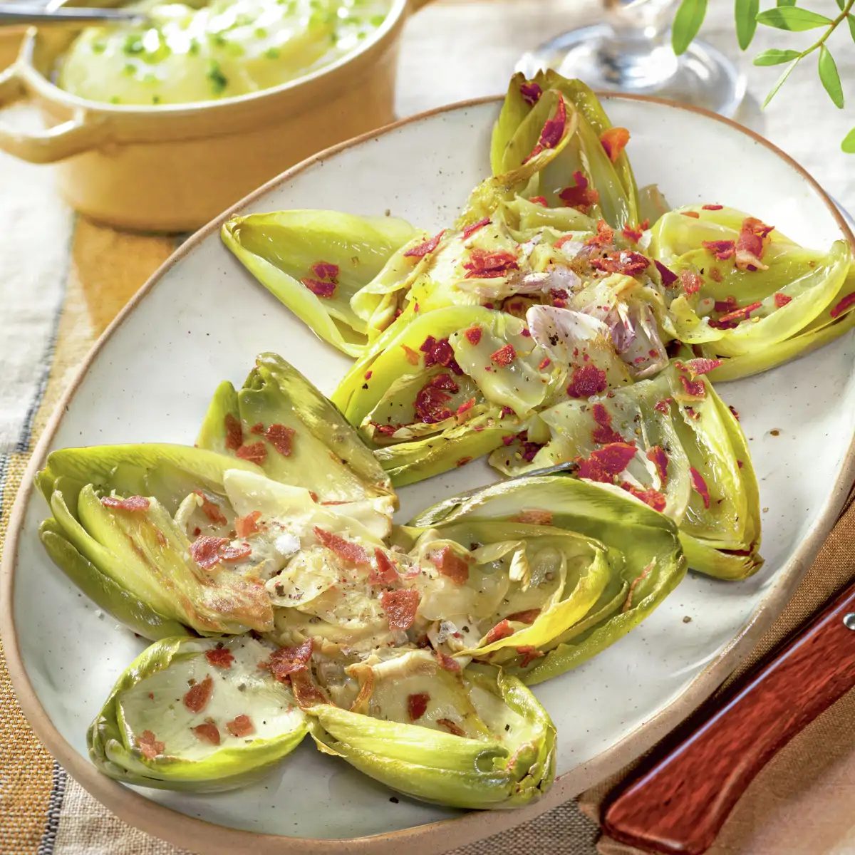 Flores de alcachofa con jamón ibérico y bechamel: la receta fácil para ...